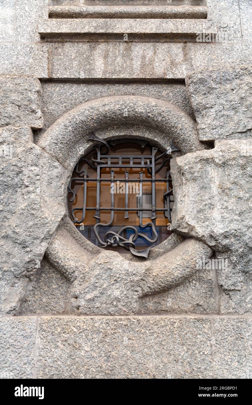 Circle shaped window on an old Italian building with carved stone ...