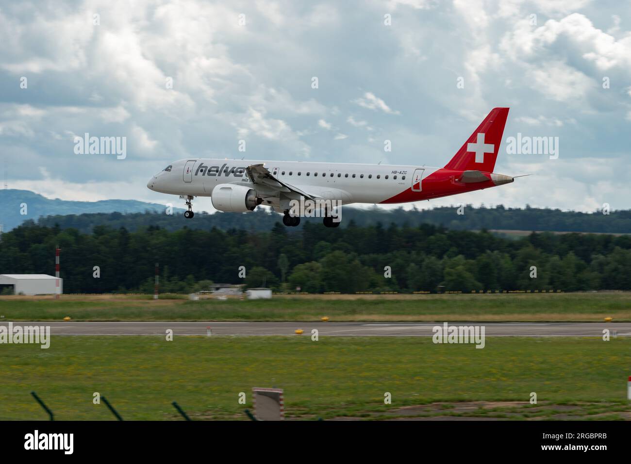 Zurich, Switzerland, July 13, 2023 HB-AZC Helvetic Airway Embraer E190 ...