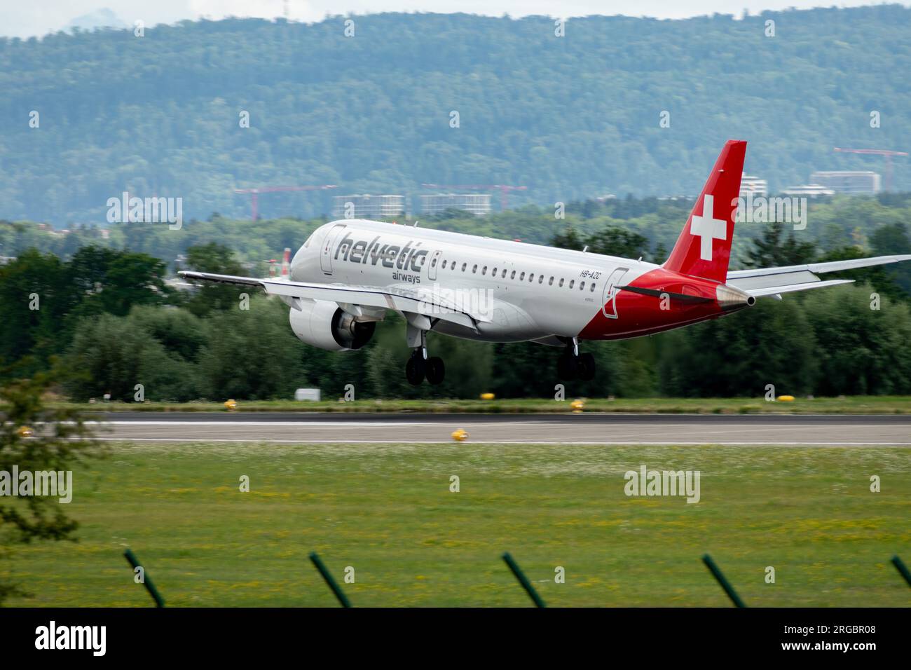 Zurich, Switzerland, July 13, 2023 HB-AZC Helvetic Airway Embraer E190 ...