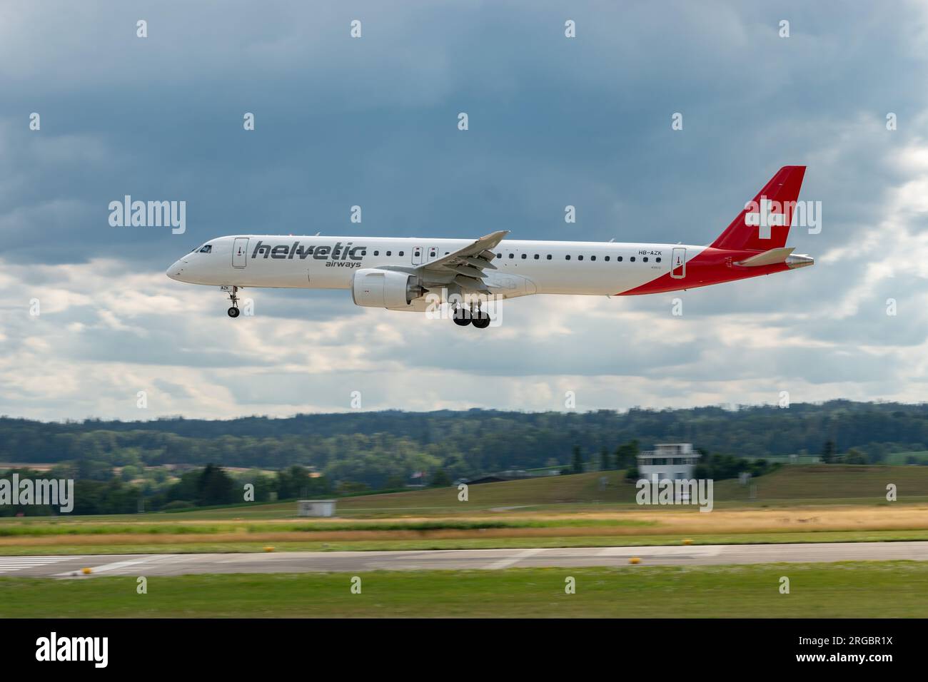 Zurich, Switzerland, July 13, 2023 HB-AZK Helvetic Airways Embraer E195 ...