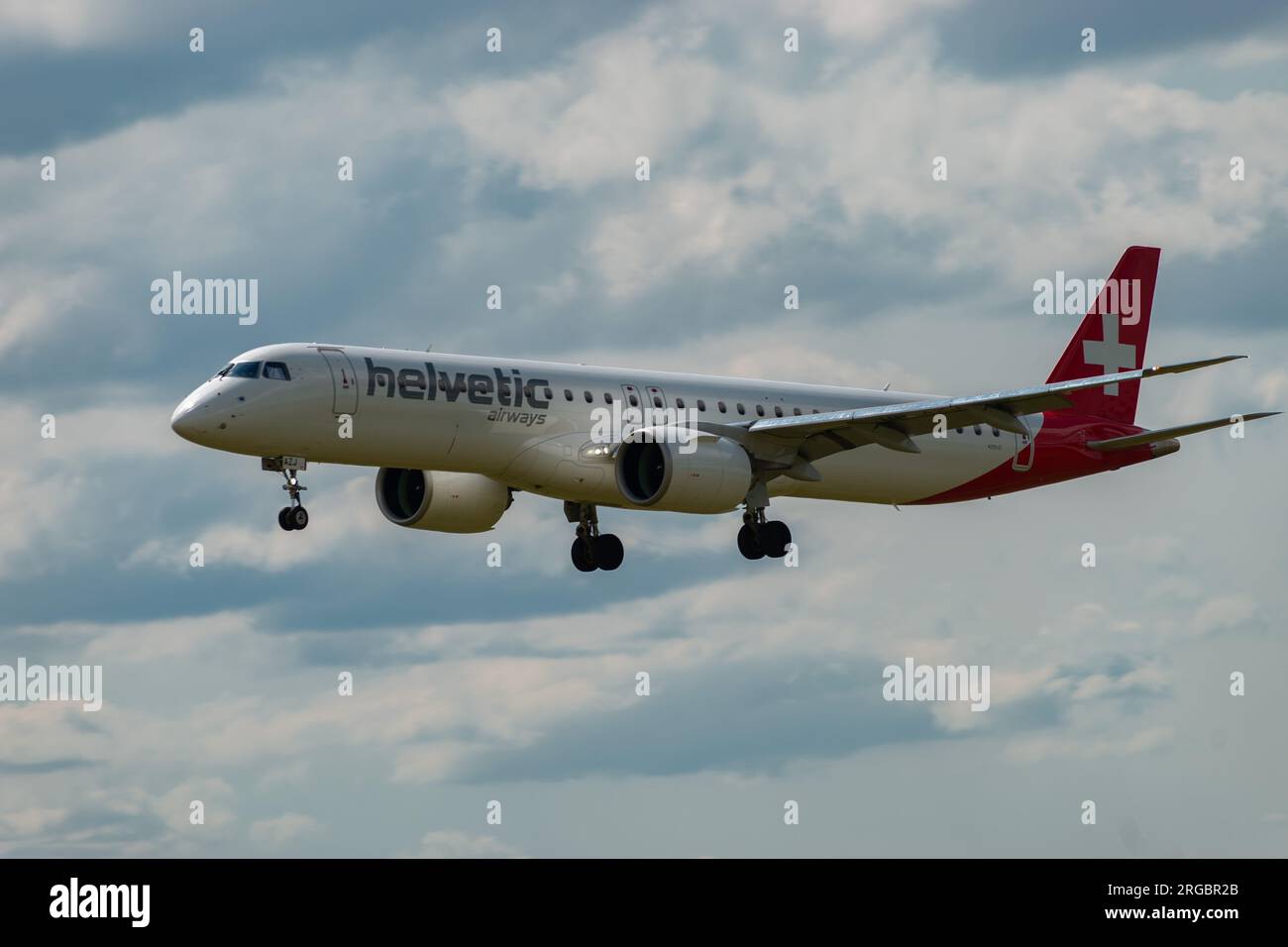 Zurich, Switzerland, July 13, 2023 HB-AZJ Helvetic Airways Embraer E195 ...