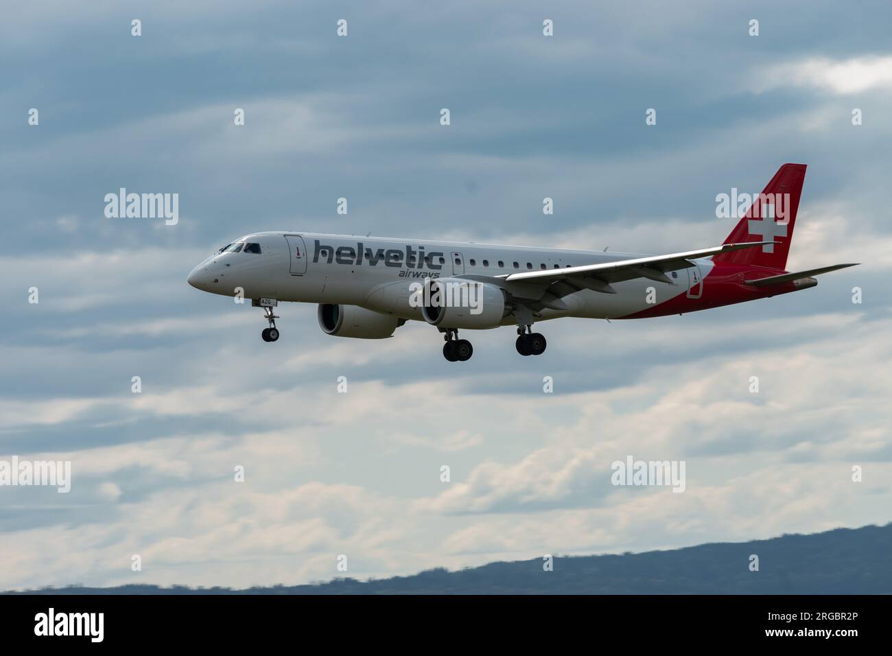 Zurich, Switzerland, July 13, 2023 HB-AZG Helvetic Airways Embraer E190 ...