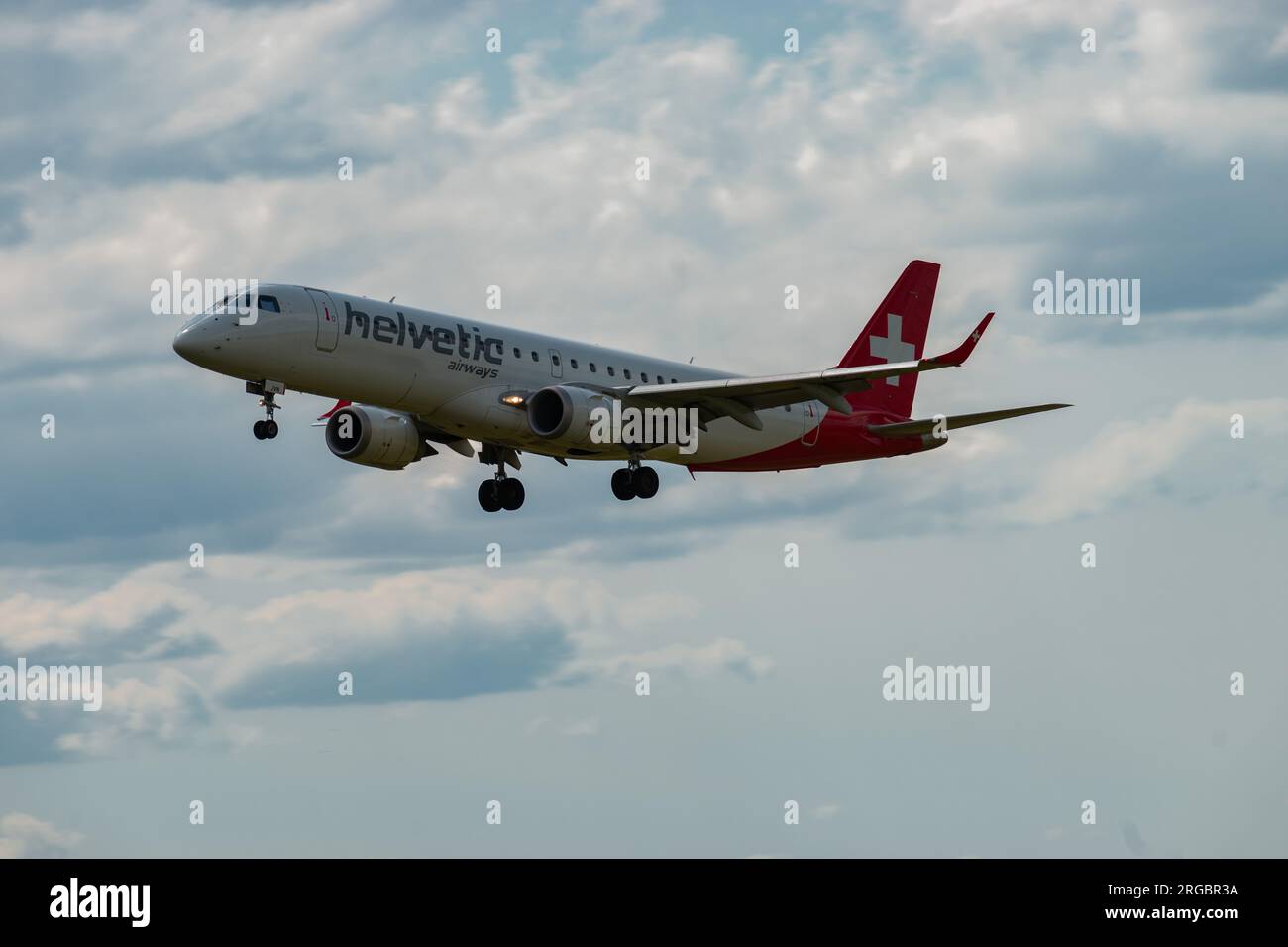 Zurich, Switzerland, July 13, 2023 HB-JVN Helvetic Airways Embraer E190 ...