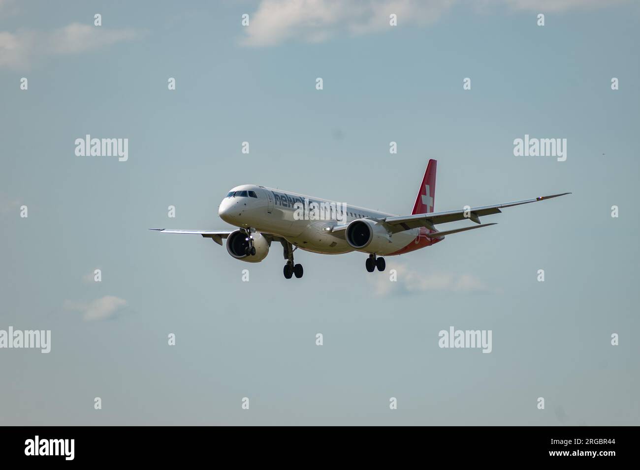 Zurich, Switzerland, July 13, 2023 HB-AZK Helvetic Airways Embraer E195 ...