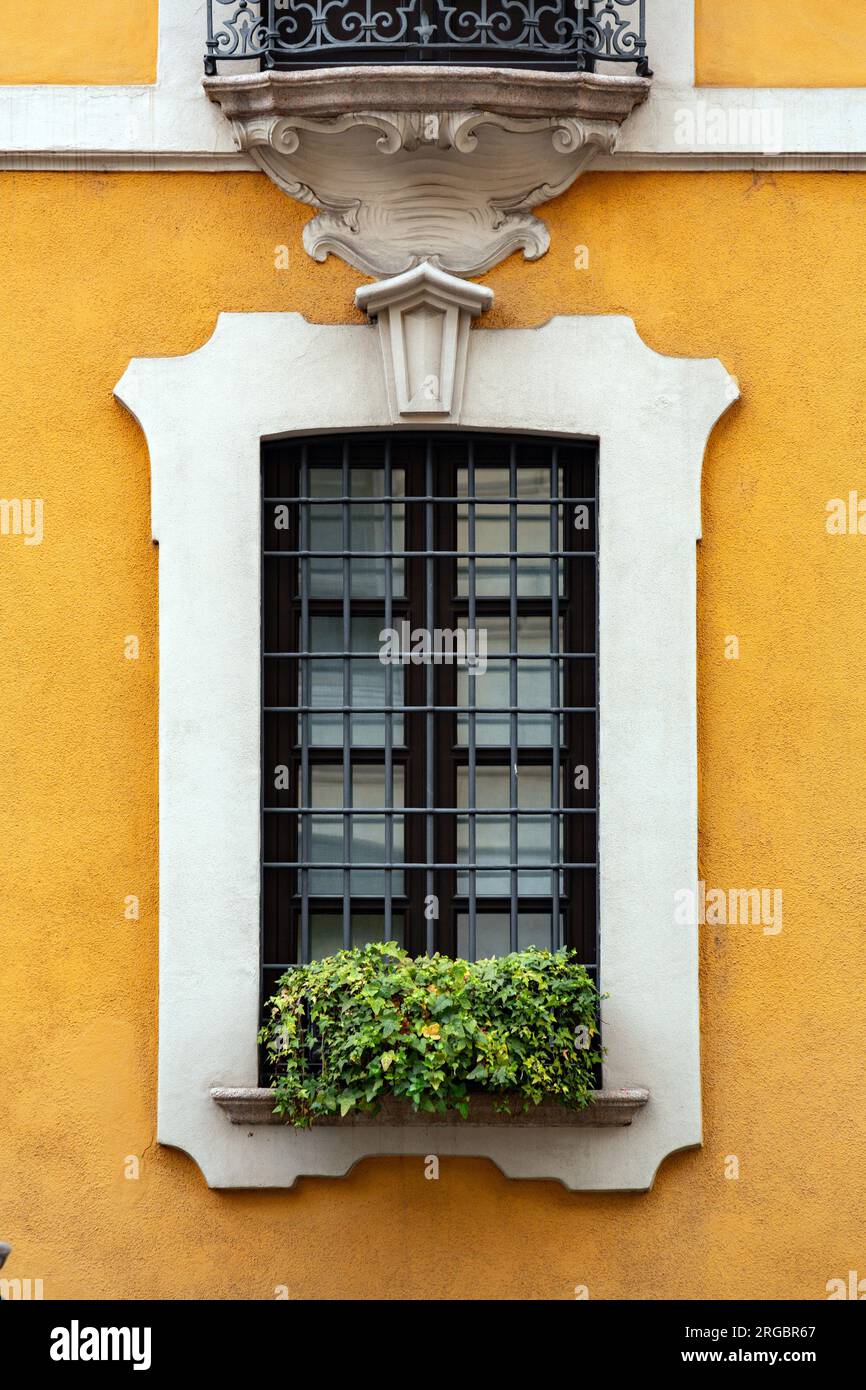 Detail from an ornate European style window of a historical building ...