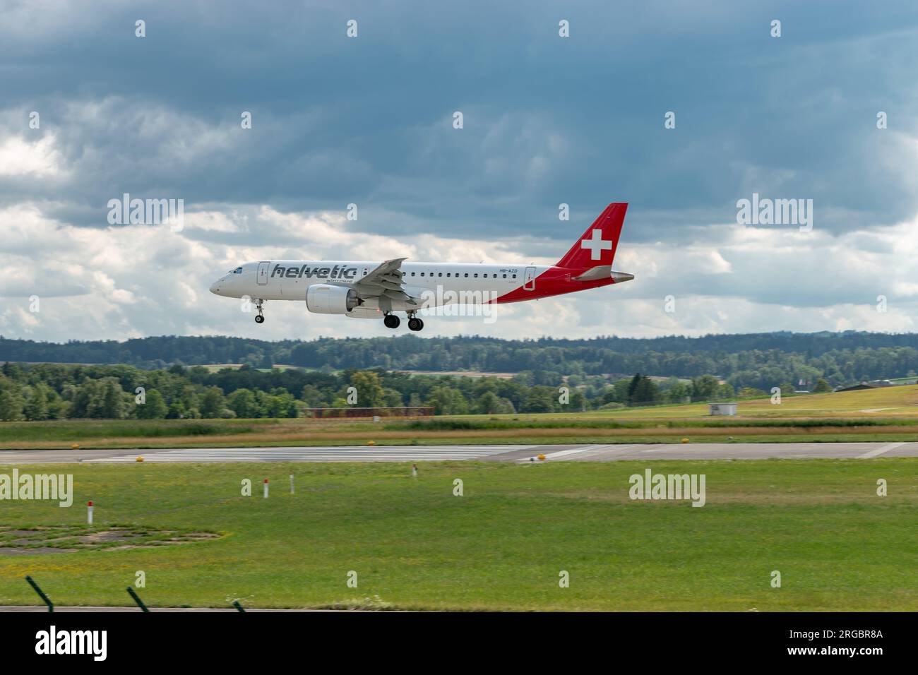 Zurich, Switzerland, July 13, 2023 HB-AZD Helvetic Airways Embraer E190 ...