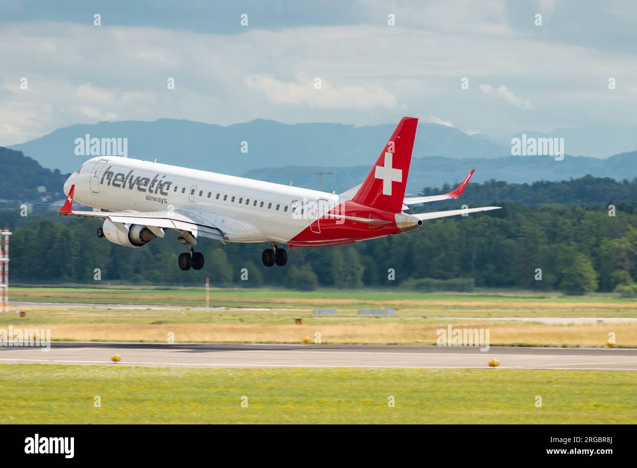 Zurich, Switzerland, July 13, 2023 HB-JVP Helvetic Airways Embraer E190 ...