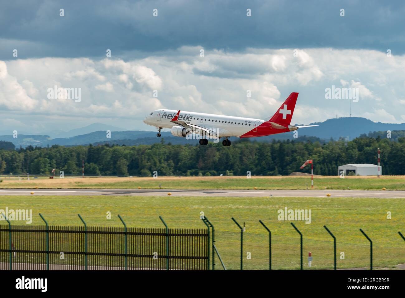 Zurich, Switzerland, July 13, 2023 HB-JVP Helvetic Airways Embraer E190 ...