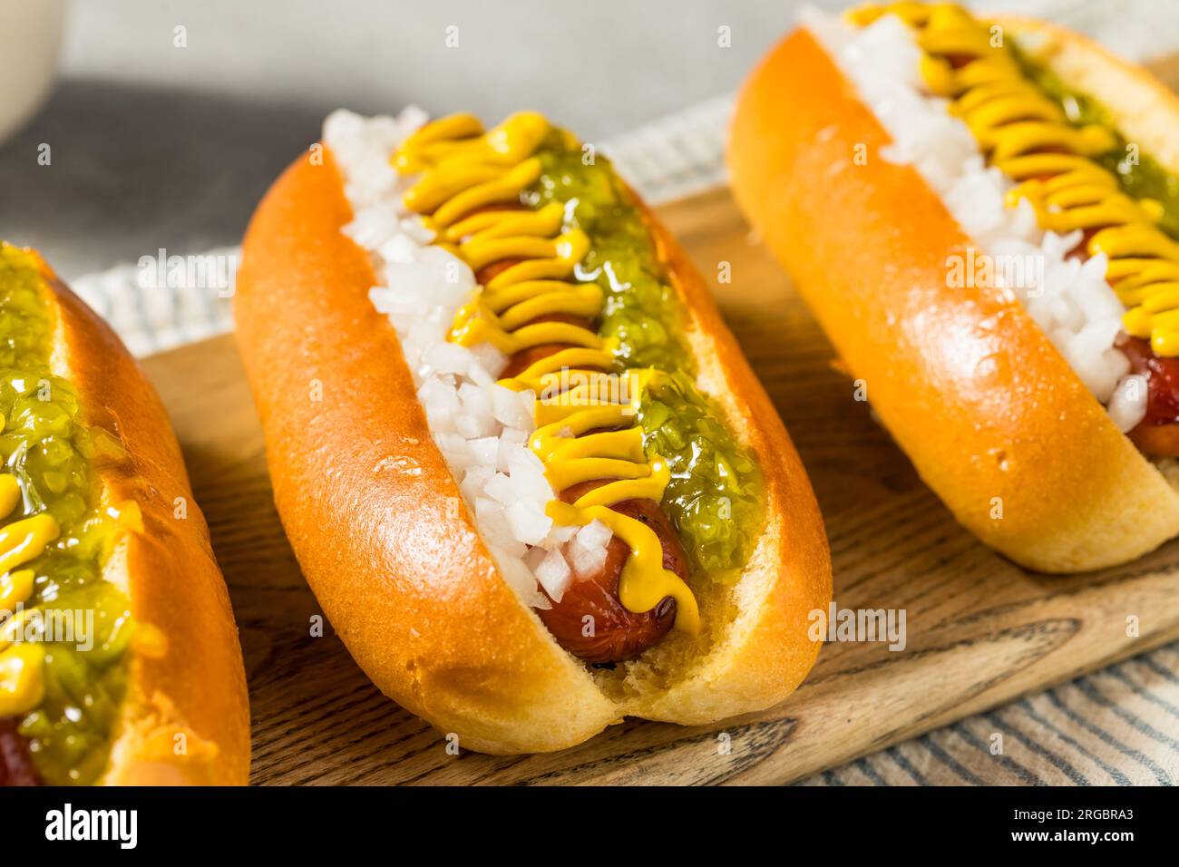Char Grilled Hot Dog with Mustard Relish and Onion Stock Photo - Alamy