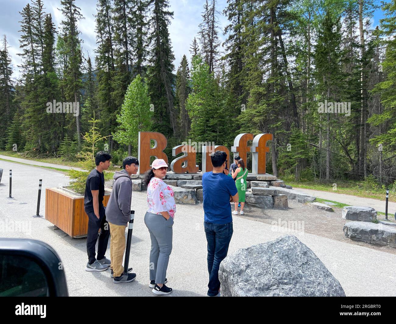 Banff, Alberta Canada - May 23, 2023: People taking the photos in front ...