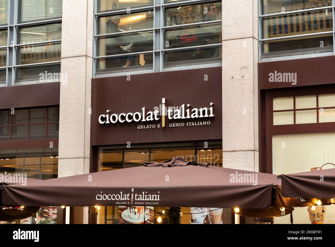 Milan, Italy - March 30: Typical Italian restaurants and street view in ...