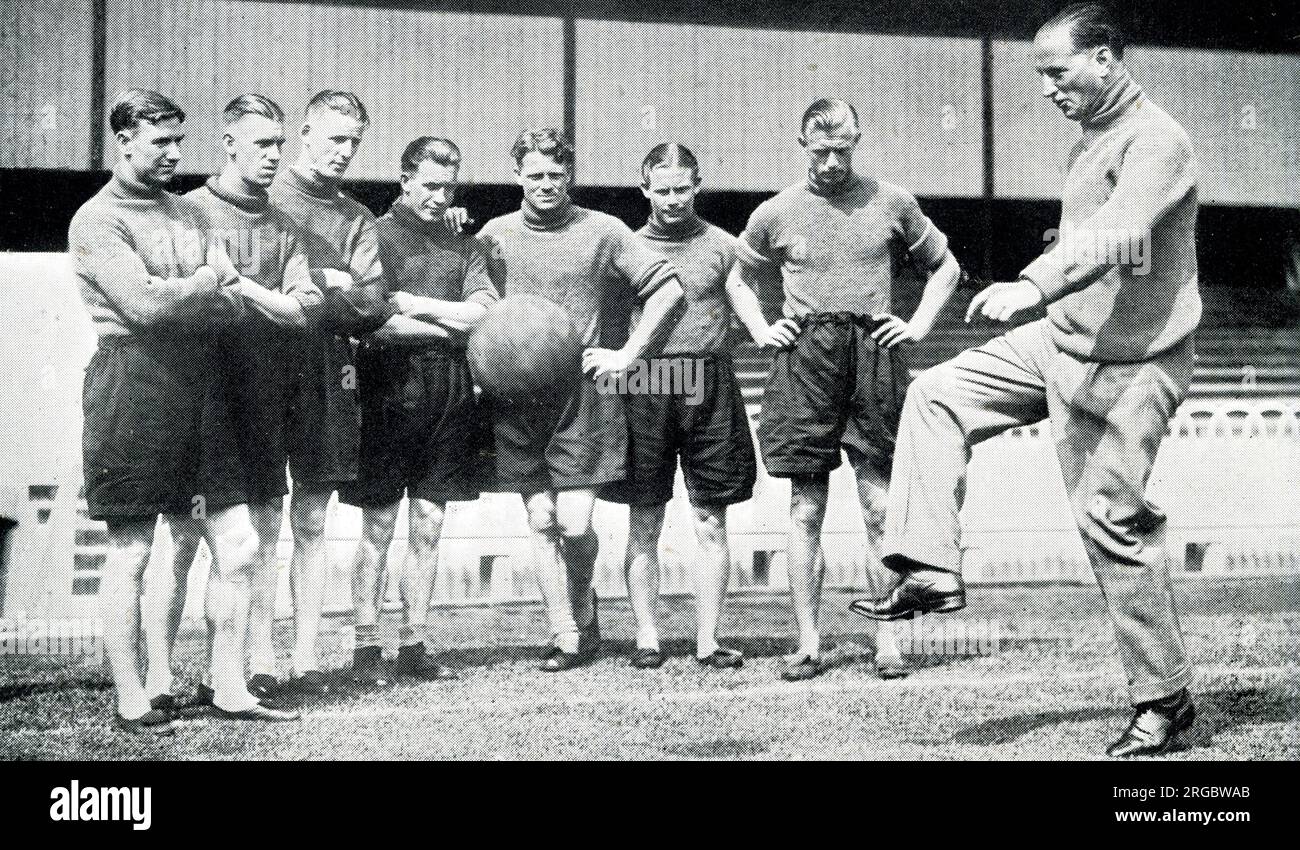 Harry Lowe one of Tottenham Hotspur's trainers shows how to trap a ball ...