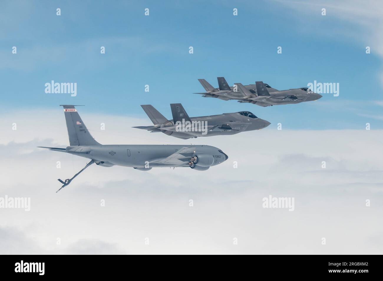 F-35s receive fuel from a KC-135 during their initial flight to Truax ...