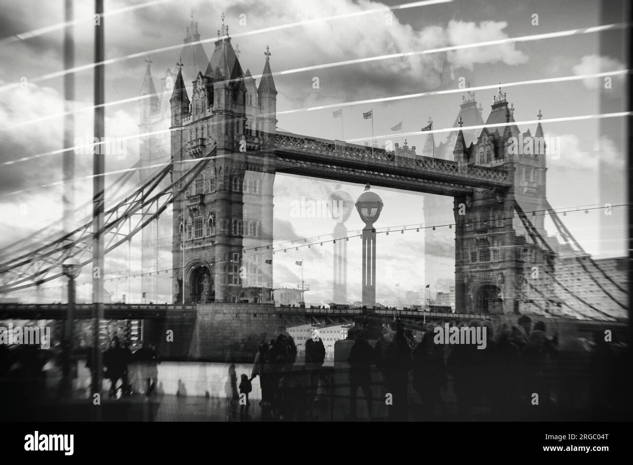 Reflection of Tower Bridge on glass building on south bank of river ...