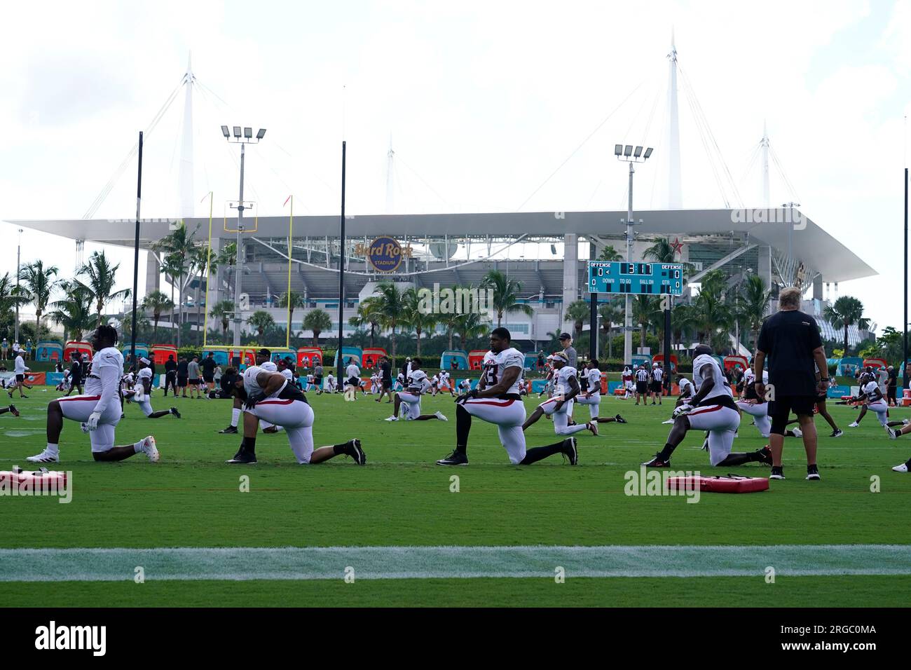 Atlanta Falcons players stretch during a joint practice with the Miami ...