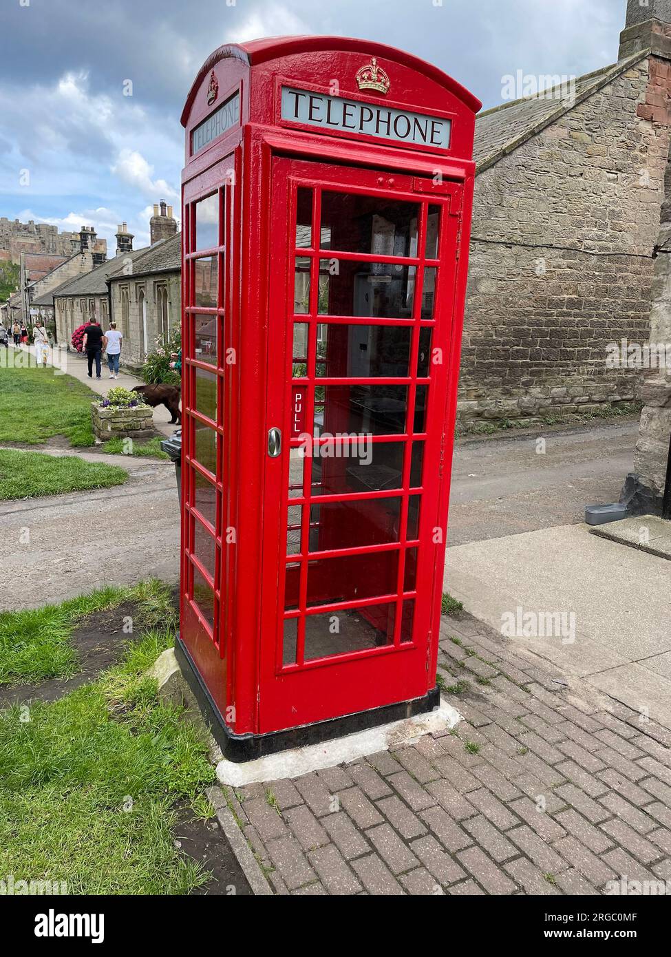 RED BT PHONE BOX in Bamburgh, Northumberland. The machinery has been ...