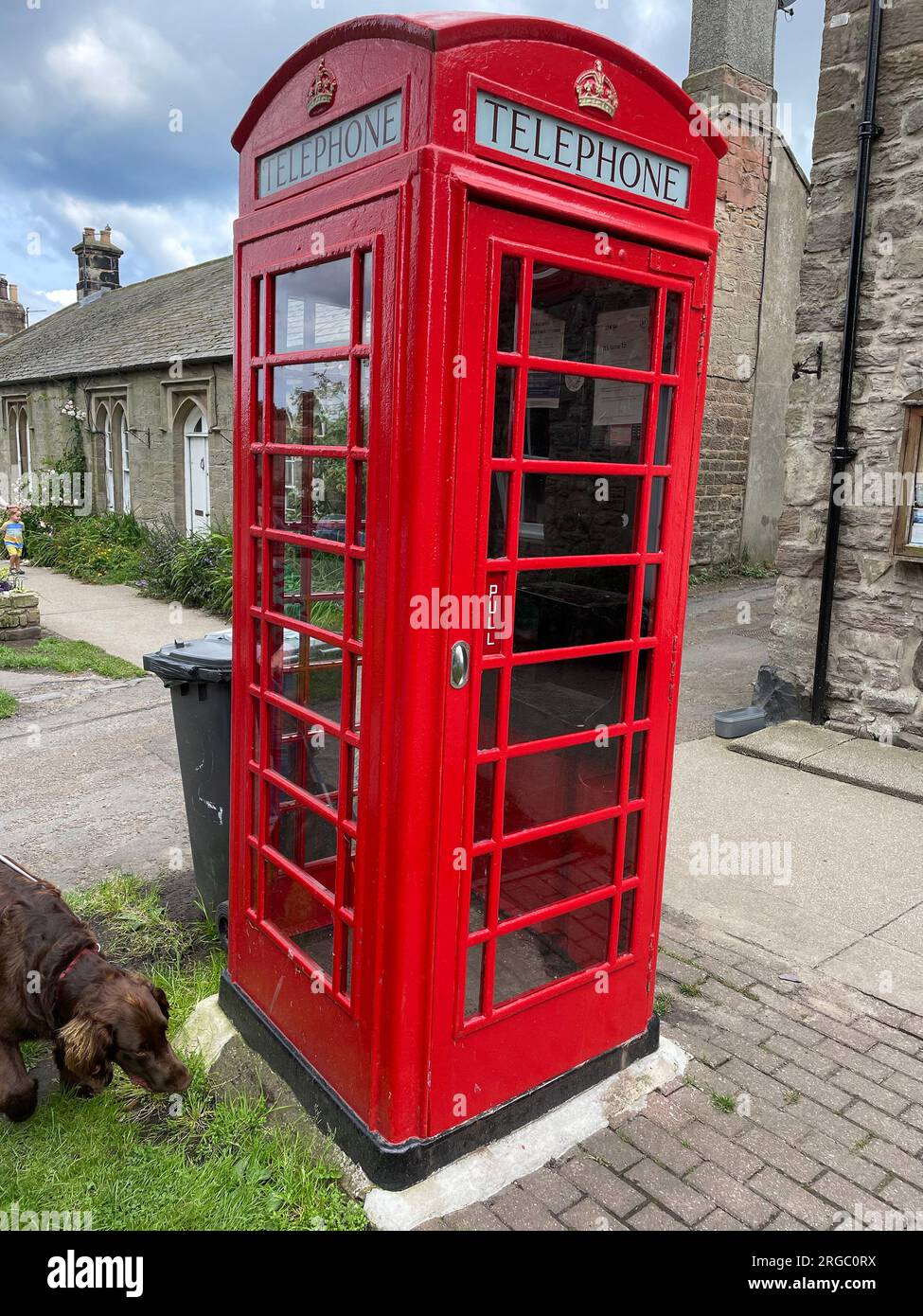 RED BT PHONE BOX in Bamburgh, Northumberland. The machinery has been ...