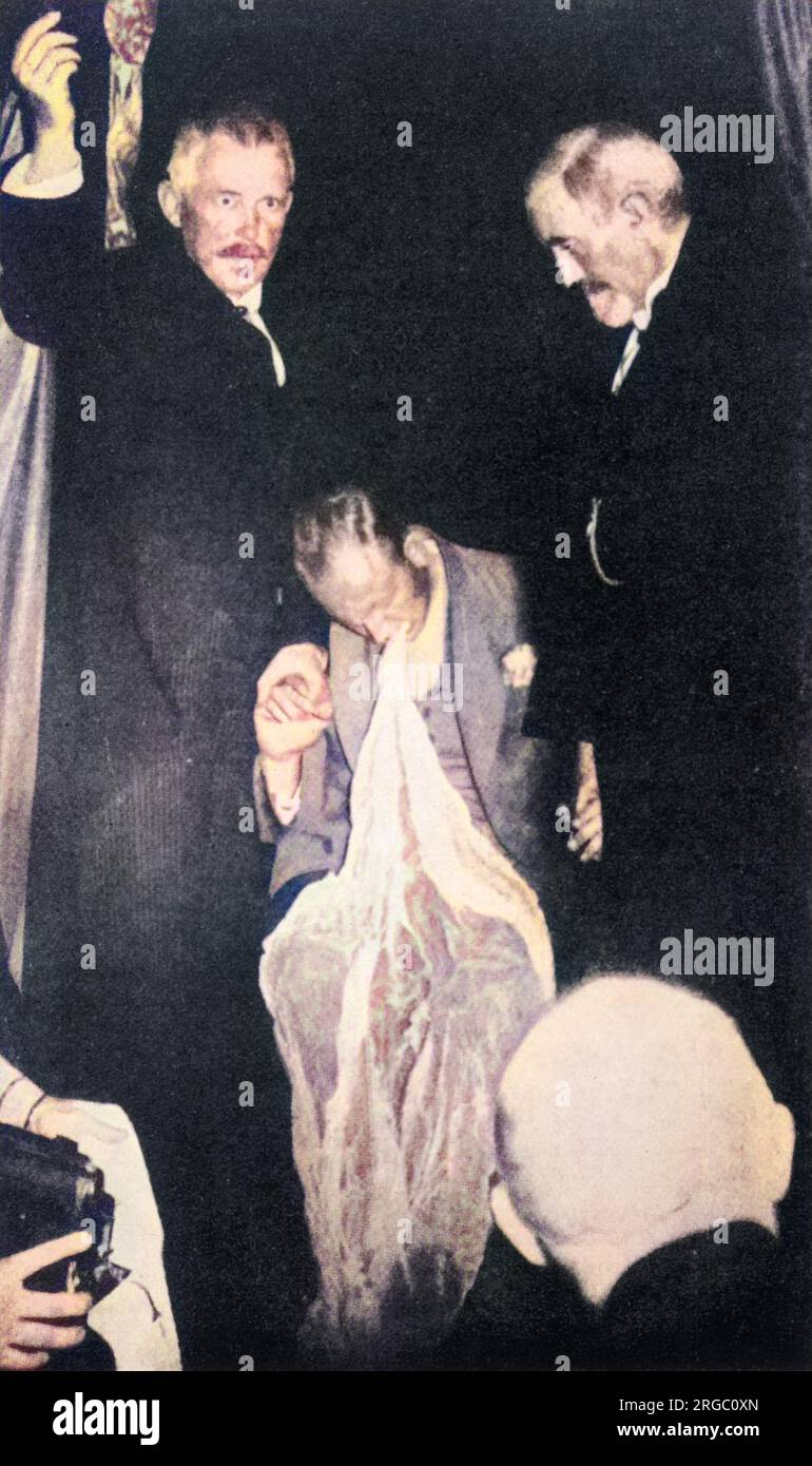 Einer Nielsen, Danish medium, producing ectoplasm at Oslo Stock Photo ...