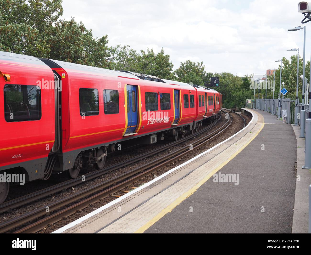 Two class 707 electric multiple units at Hampton Wick station in London in the UK Stock Photo ...