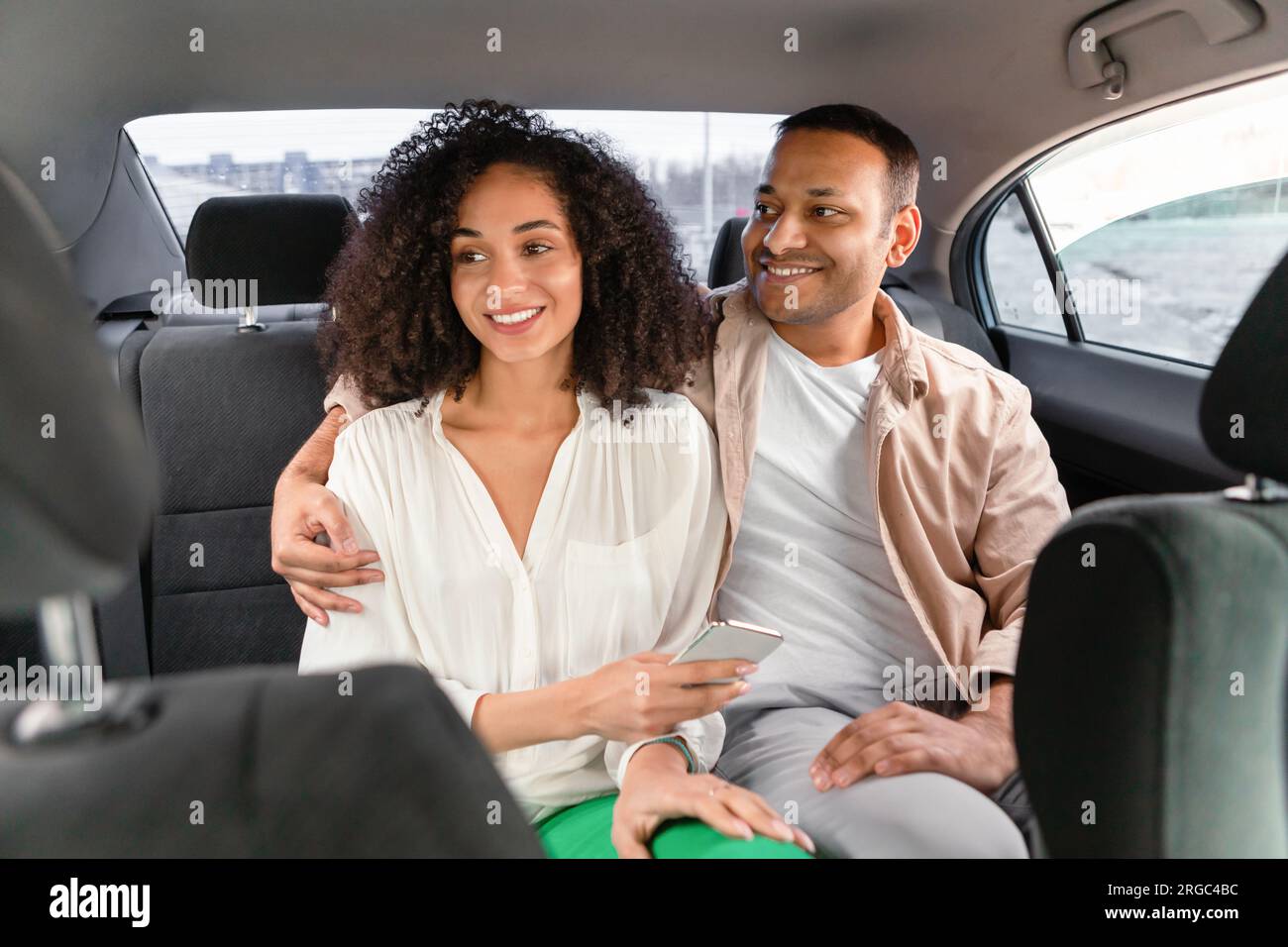 Happy in back of car passengers hi-res stock photography and images - Alamy