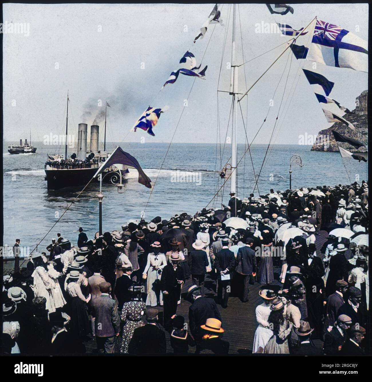 A crowd clamour to get a good glimpse of 'St. Elvies' a paddle steamer ...
