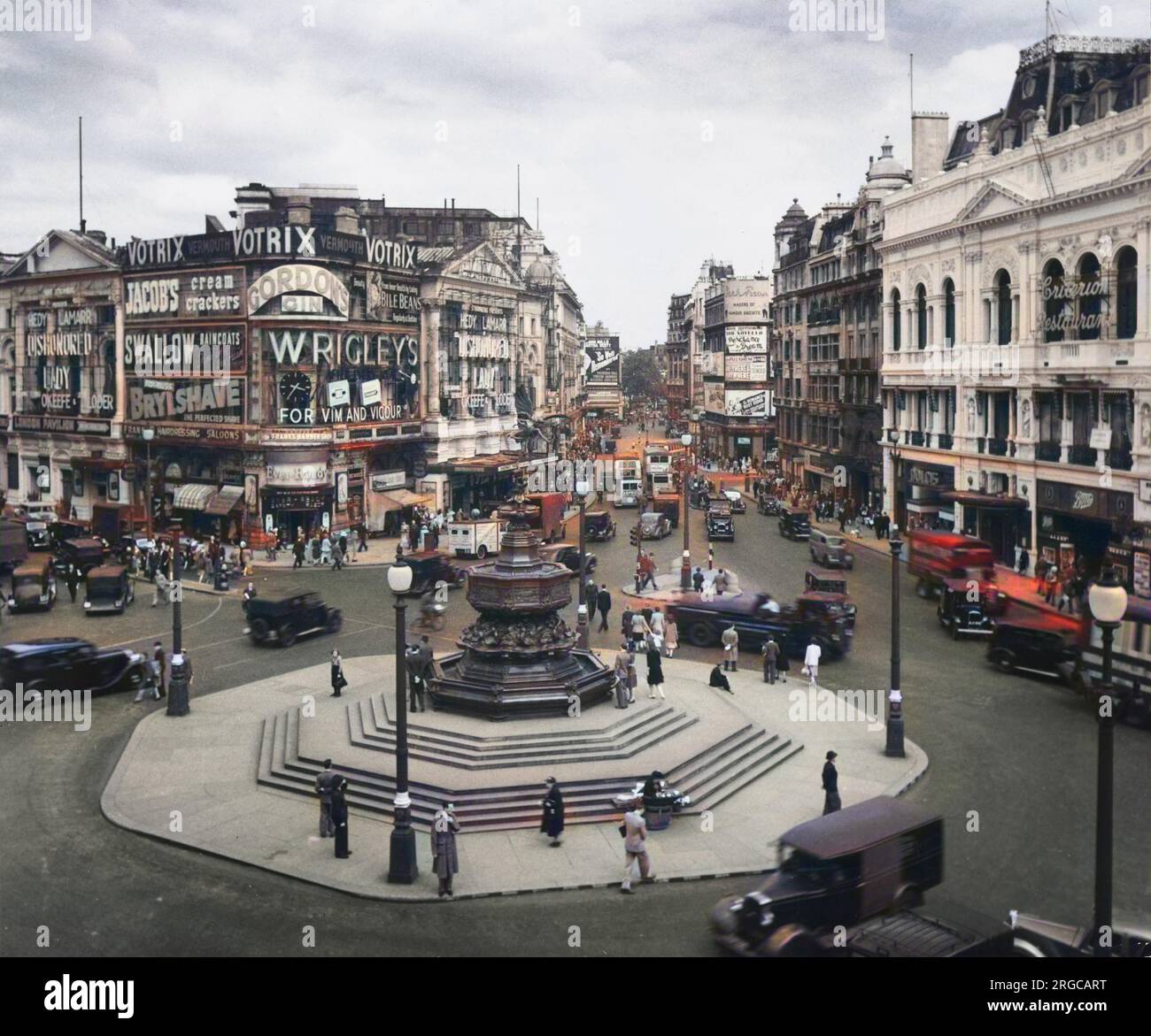 Piccadilly Circus and the Statue of Eros, London. The street scene is ...