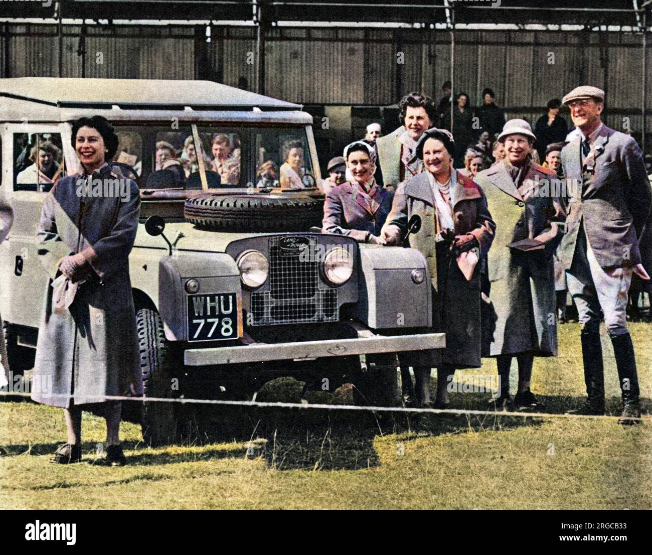 The Queen and other members of the Royal Family stand by a Land-Rover ...
