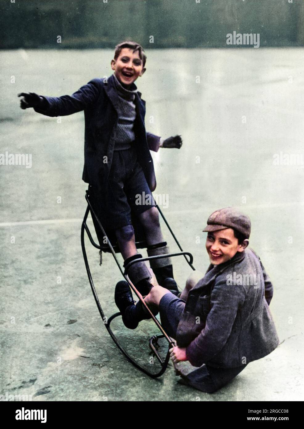 WW2 - Home Front, November 1940 - Two boys playing on a see saw - happy ...