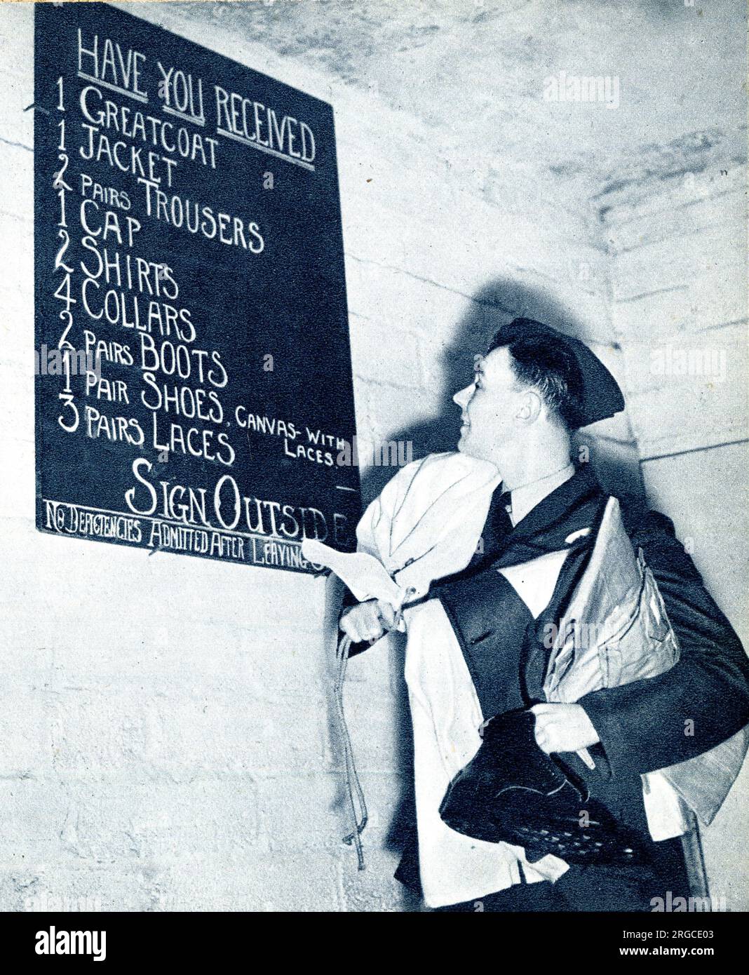 RAF recruit checking the kit list Stock Photo - Alamy