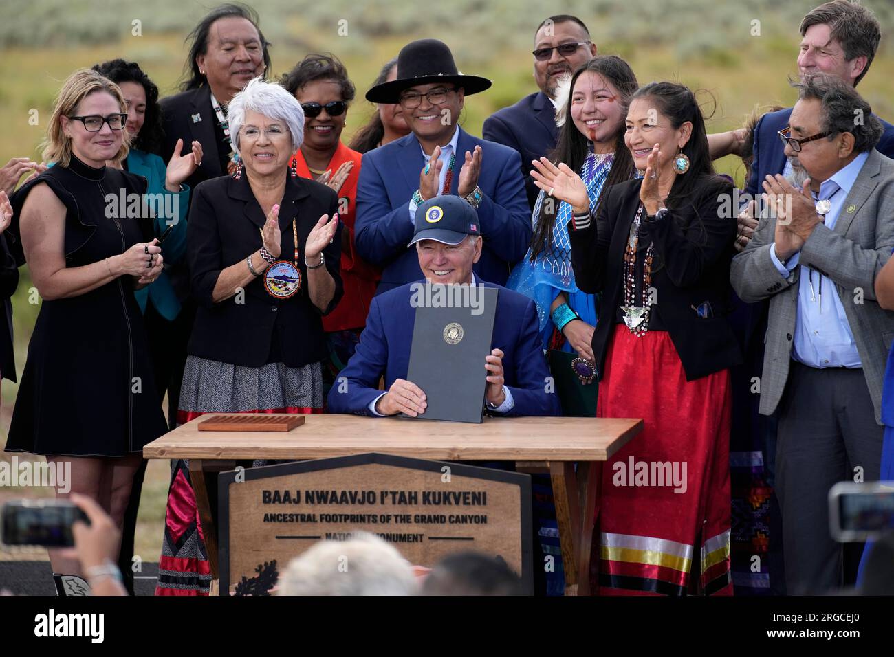 President Joe Biden holds up a proclamation designating the Baaj ...