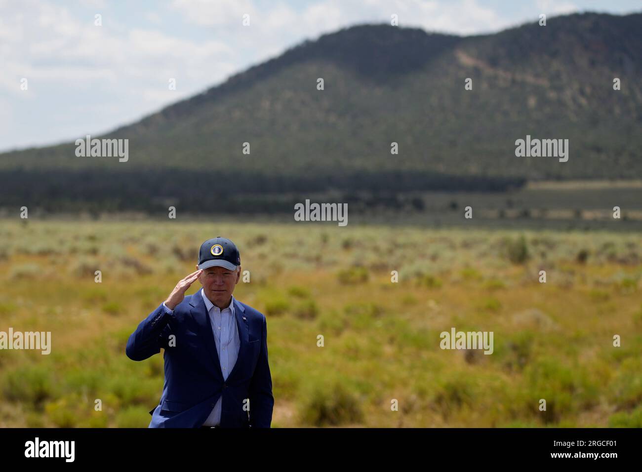 President Joe Biden moties after speaking where he signed a ...