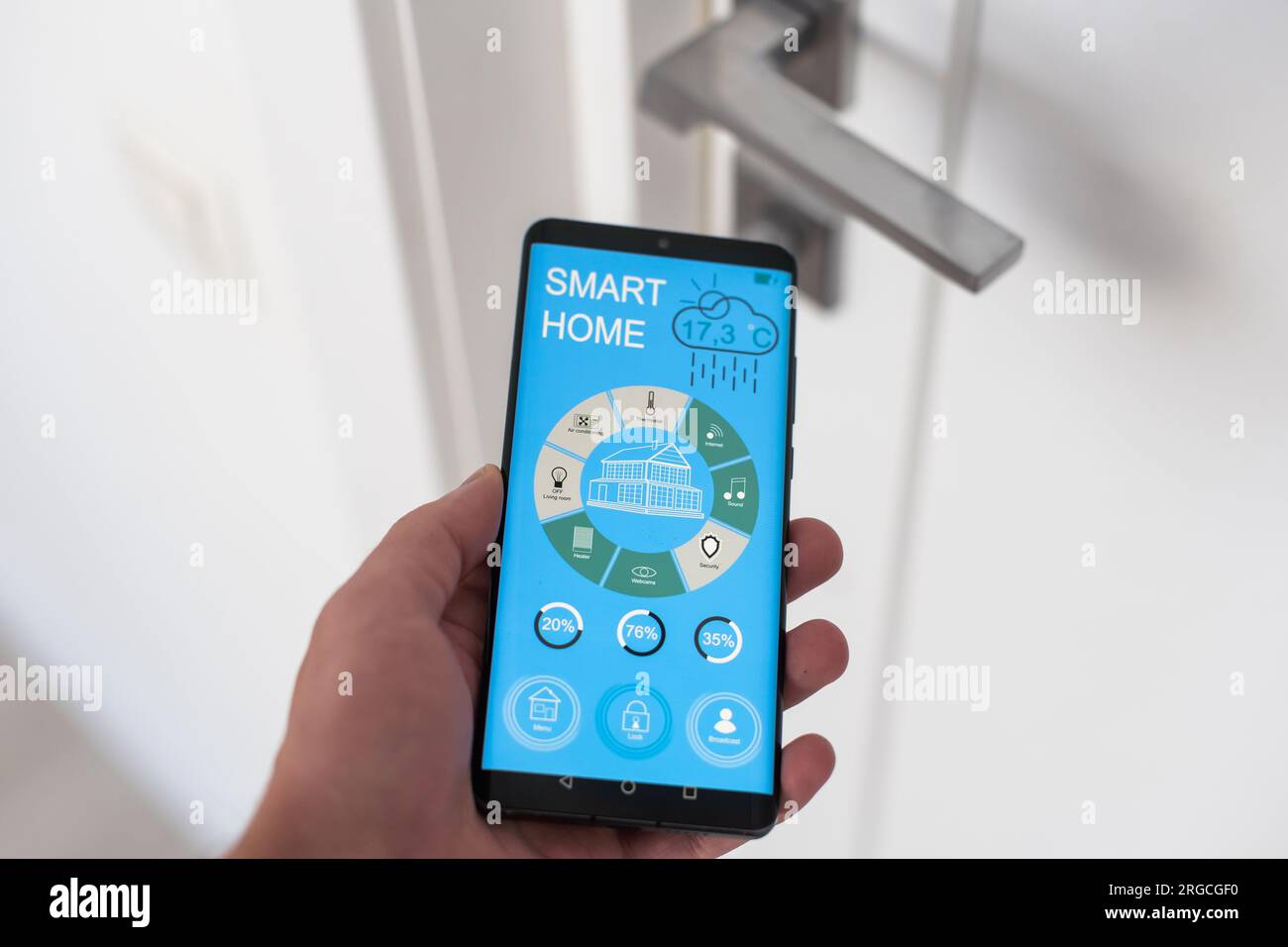 smart house, home automation, device with app icons. Man uses his ...