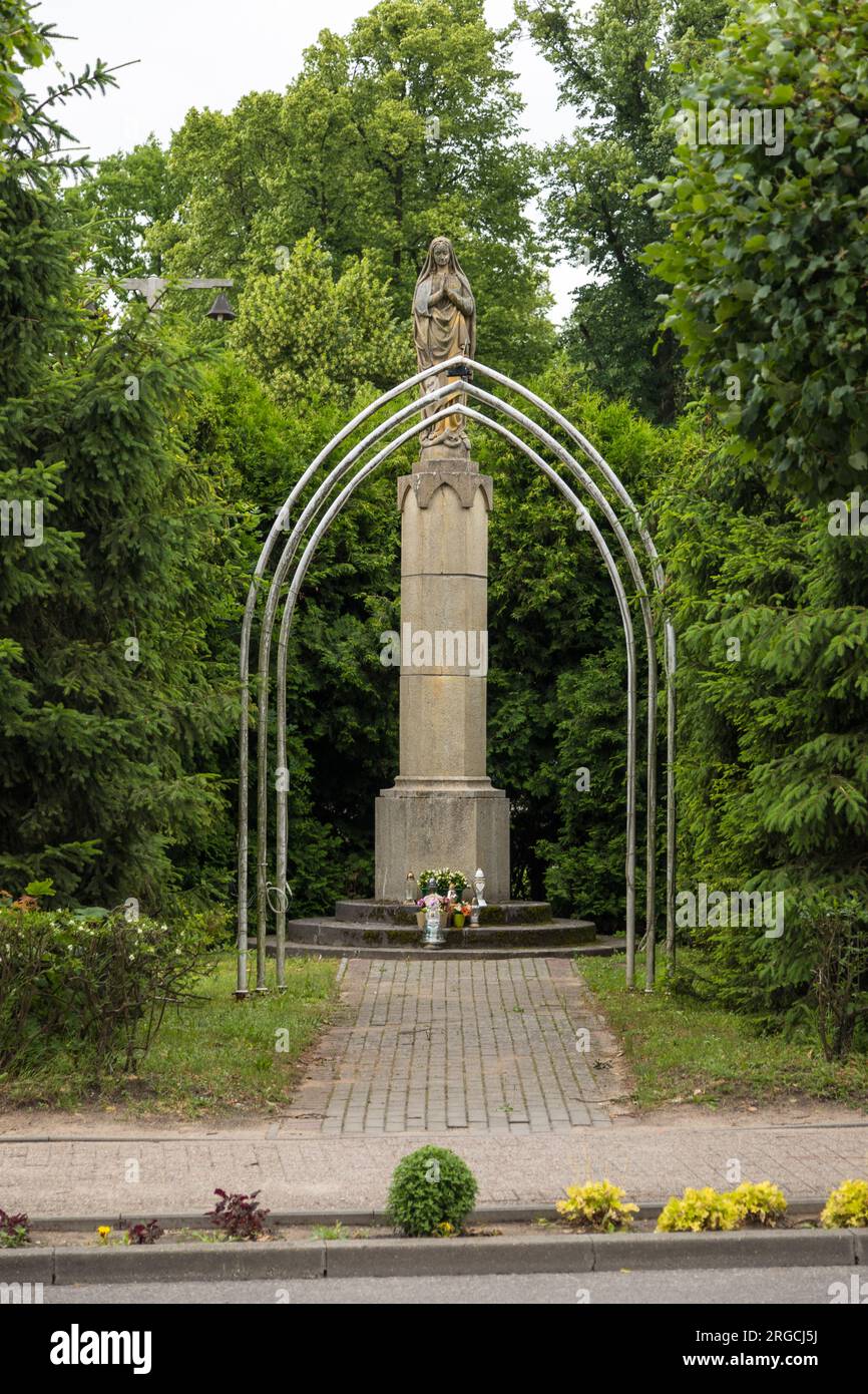 The statue of the Mother of God at Mariacki Square in Pelplin. Poland ...