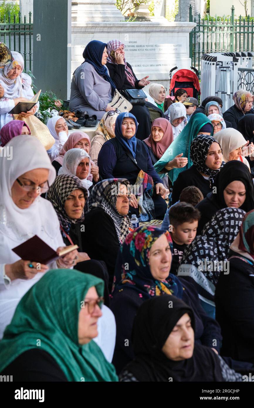 Istanbul, Turkey, Turkiye. Eyup Sultan Mosque, Women Seated Outside the ...