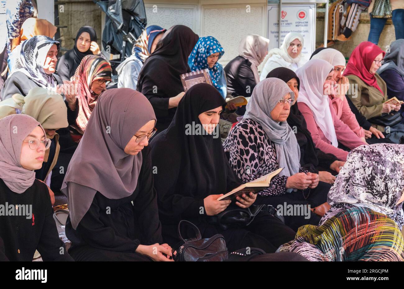 Istanbul, Turkey, Turkiye. Eyup Sultan Mosque, Women Seated Outside the ...