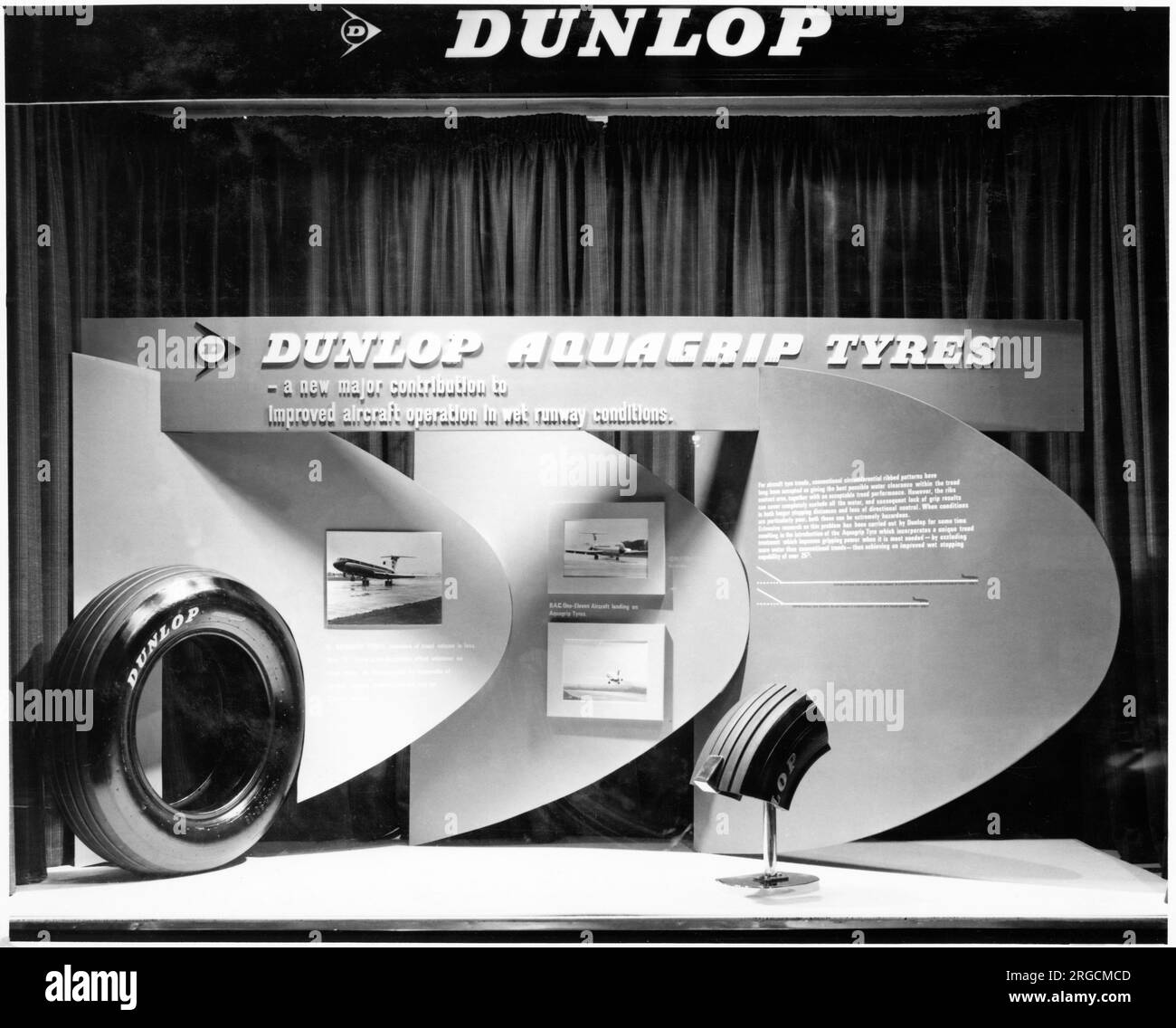 Window display for Dunlop's 'Aquagrip' tyres Stock Photo - Alamy