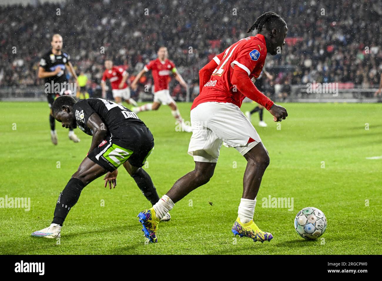 EINDHOVEN - 08/08/2023, (lr) Dante Amadou of Sturm Graz, Johan Bakayoko ...