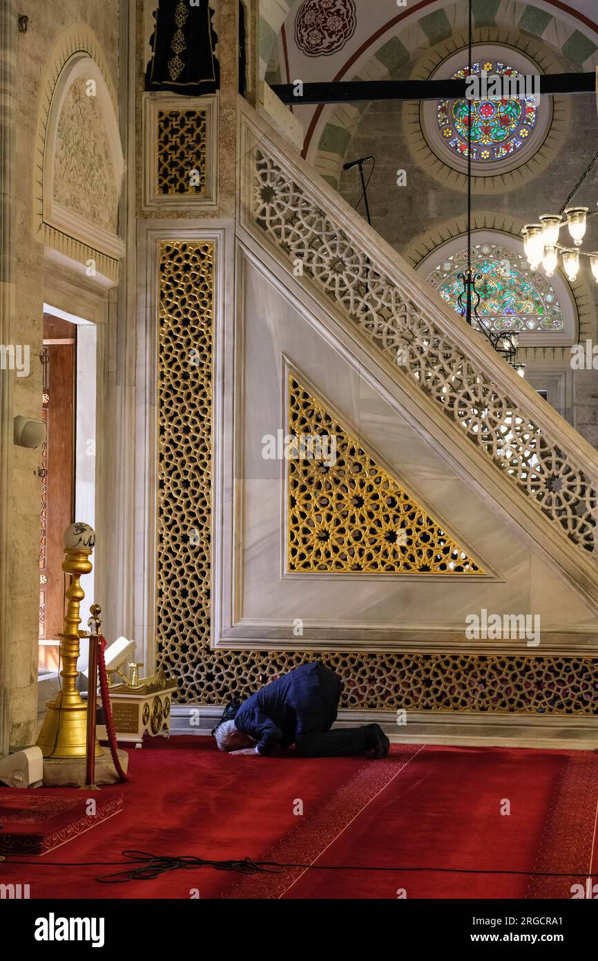 Istanbul, Turkey, Türkiye. Mihrimah Sultan Mosque, Uskudar. Man Praying ...