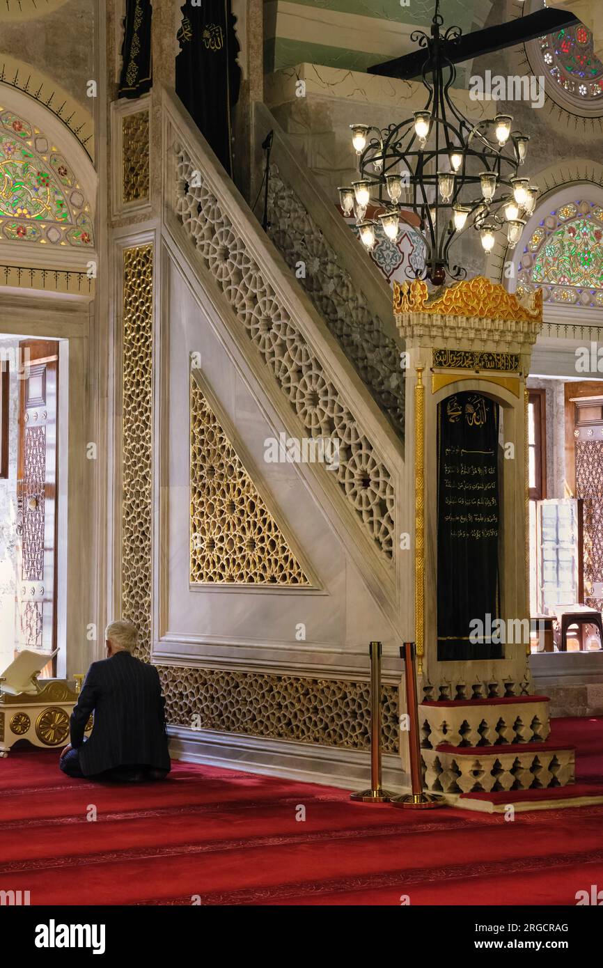 Istanbul, Turkey, Türkiye. Mihrimah Sultan Mosque, Uskudar. Man Praying ...