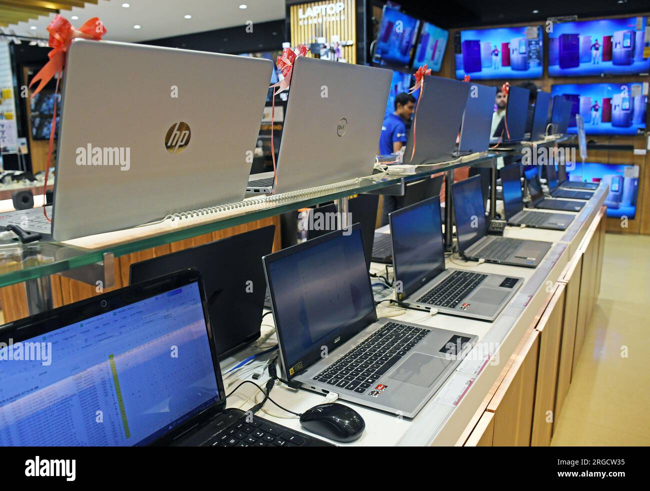 Mumbai, India. 08th Aug, 2023. Laptops of different brands are kept on ...