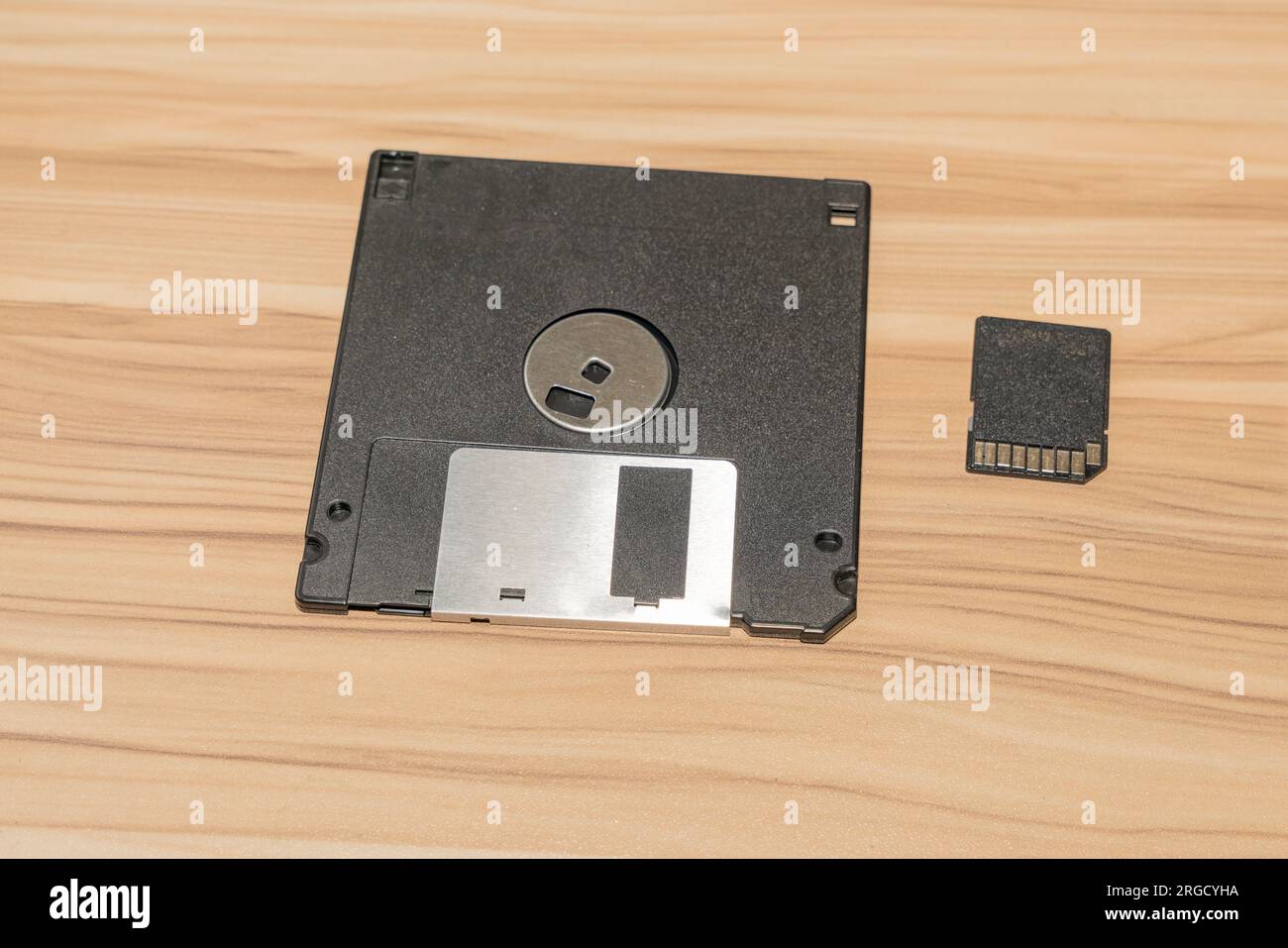 Photography of varios media storage device on brown wood background ...