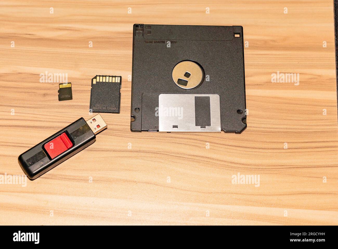 Photography of varios media storage device on brown wood background ...