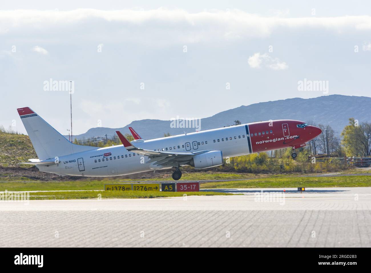 Norwegian plane Boeing 737 taking off from Bergen Airport, Norway Stock ...