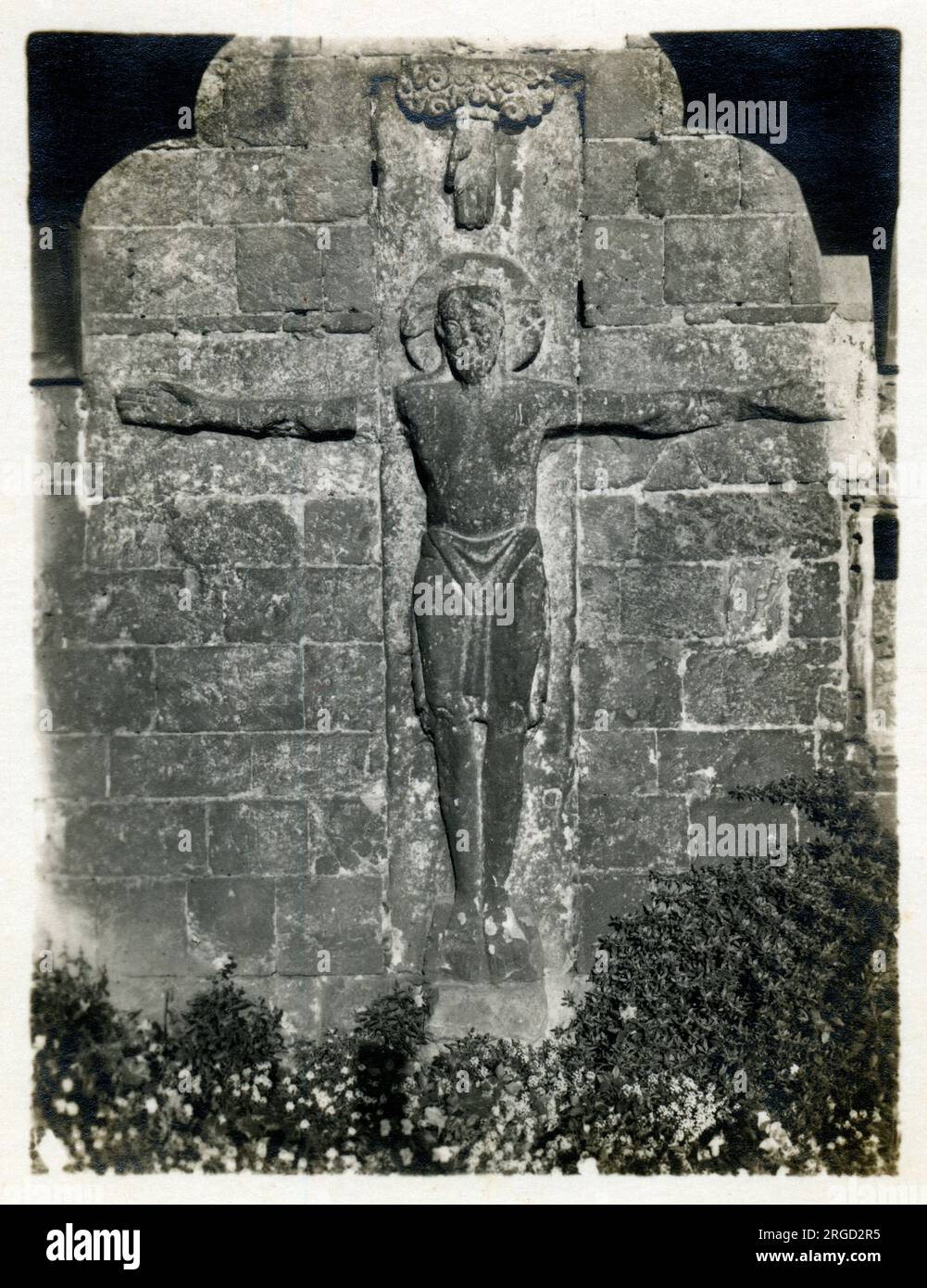 Medieval painted 11th Century Rood affixed to the exterior wall of ...