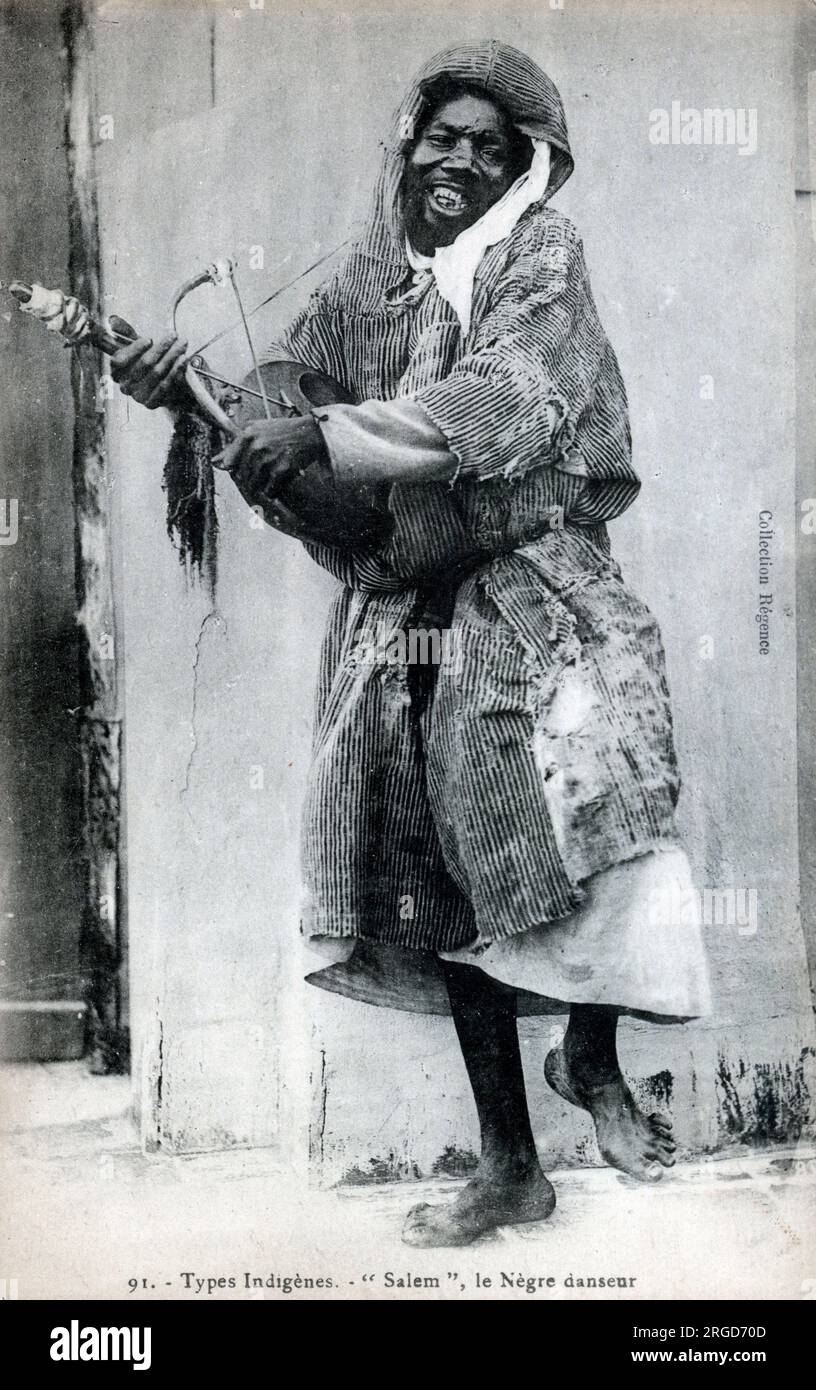 Algiers, Algeria - Salem, a street troubadour and dancer, playing his ...