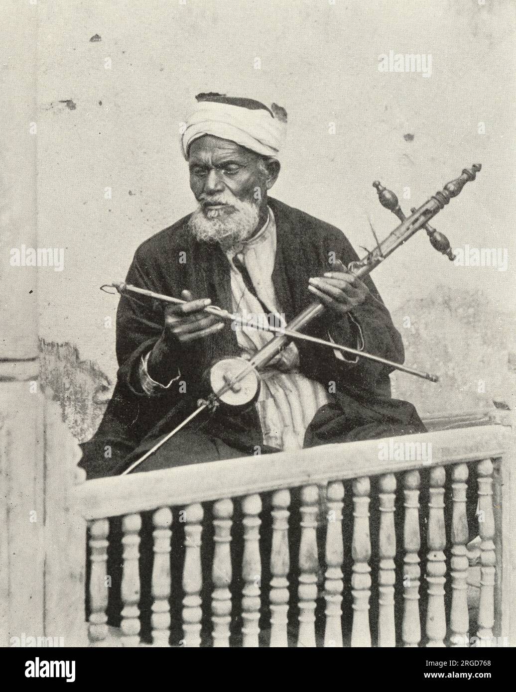 Arabian musician playing the Rababa Stock Photo - Alamy