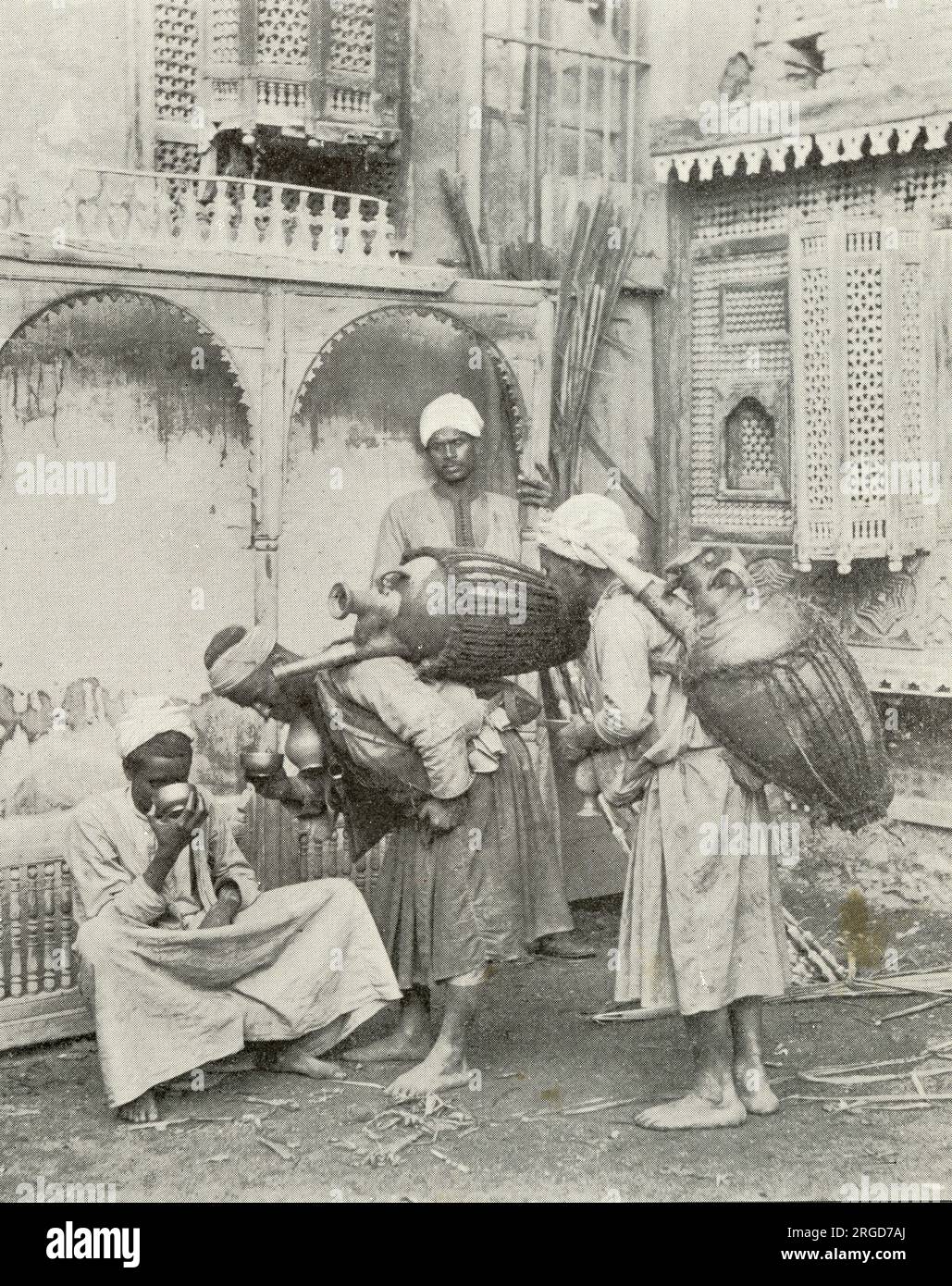 Fakir selling aromatic water in the streets of Cairo, Egypt Stock Photo ...