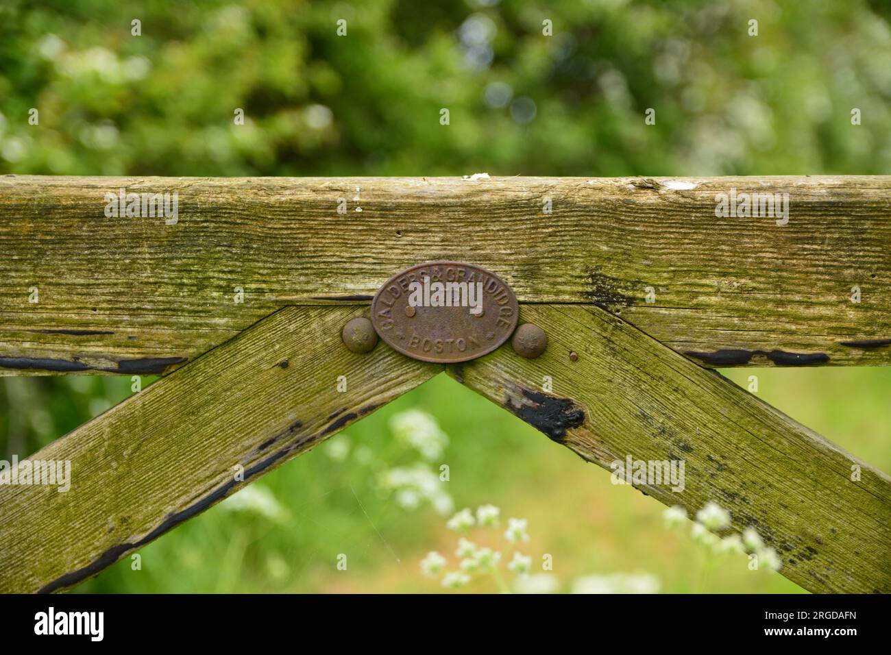 English oak farm gate detail showing makers badge Stock Photo - Alamy