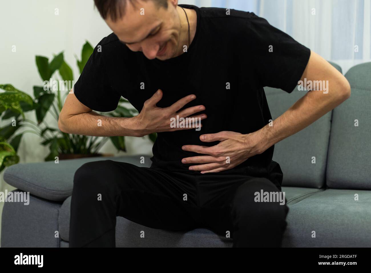 African american man suffering stomach hi-res stock photography and ...