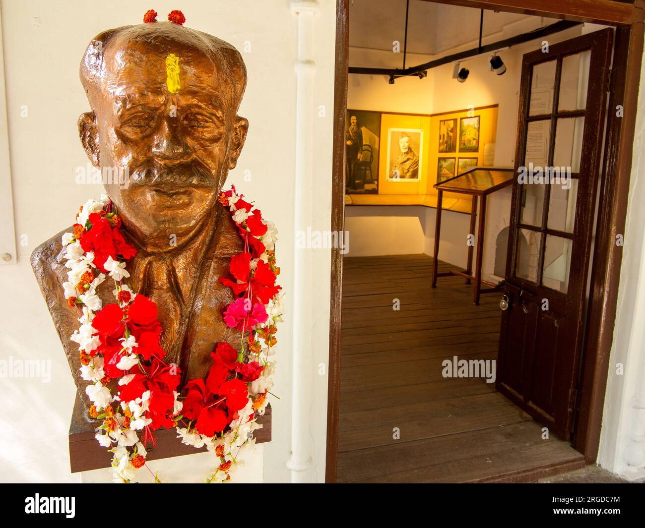 A garland of flowers on Jim Corbett statue at the aniversary of his ...